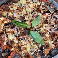 Black Crust Pizzeria - Vik Restaurant - HappyCow